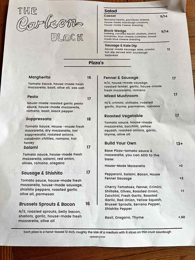 When a menu lists house-made mozzarella and sourdough crust, you know someone's taking pizza seriously around here.