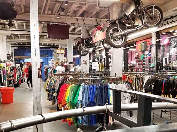 Motorcycles hanging from the ceiling because normal retail displays are for normal stores, apparently.