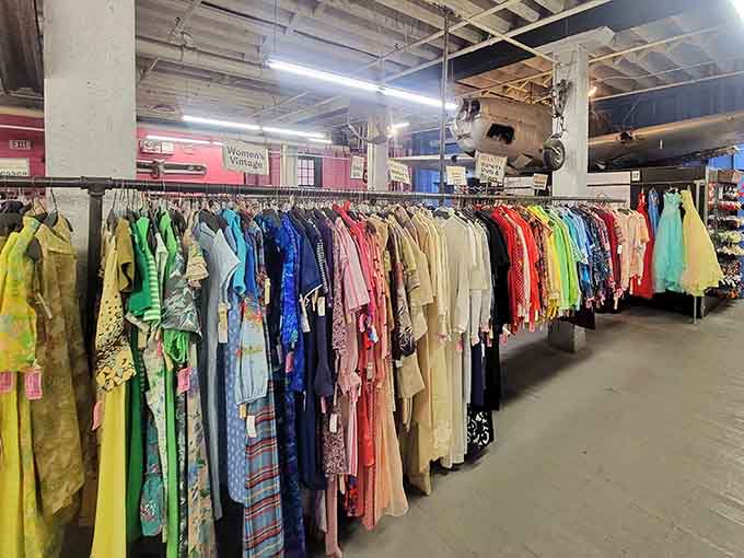 Rainbow-organized vintage dresses stretching into infinity &ndash; it's like a fashion lover's fever dream come true.