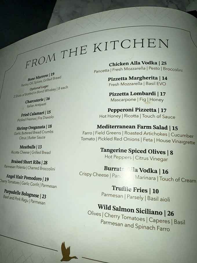 The menu reads like a love letter to Italian cuisine, each dish a carefully crafted invitation to culinary bliss.