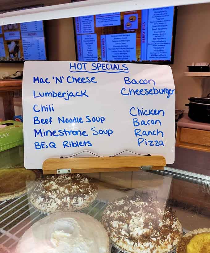 That handwritten specials board proves comfort food doesn't need fancy fonts, just honest deliciousness and good penmanship.