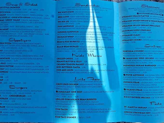 A turquoise menu is basically a written invitation to stop taking life so seriously for an hour.