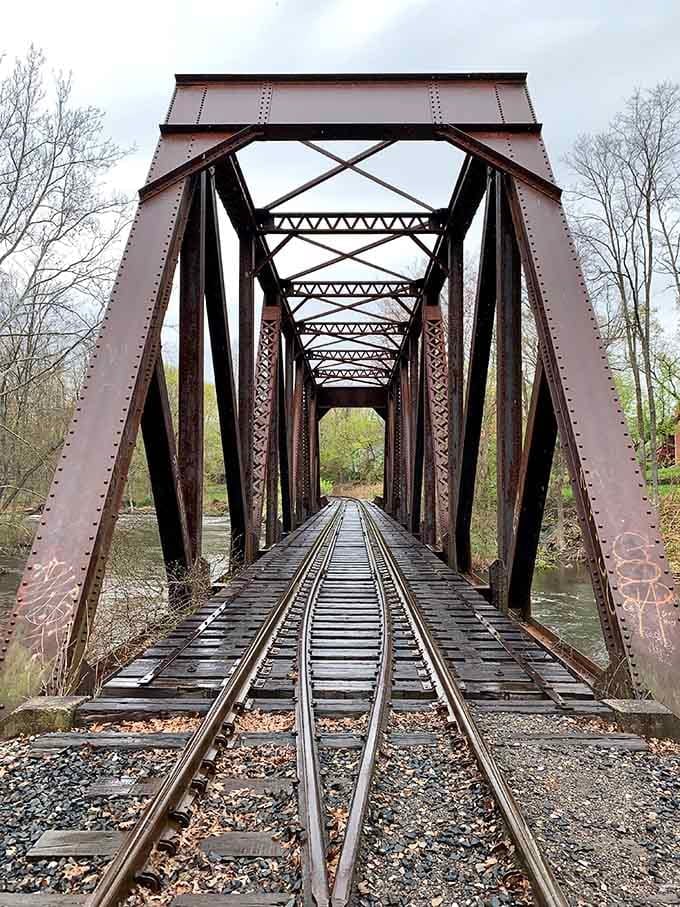 This old railroad bridge has seen more history than most of us, standing strong over the Yantic.