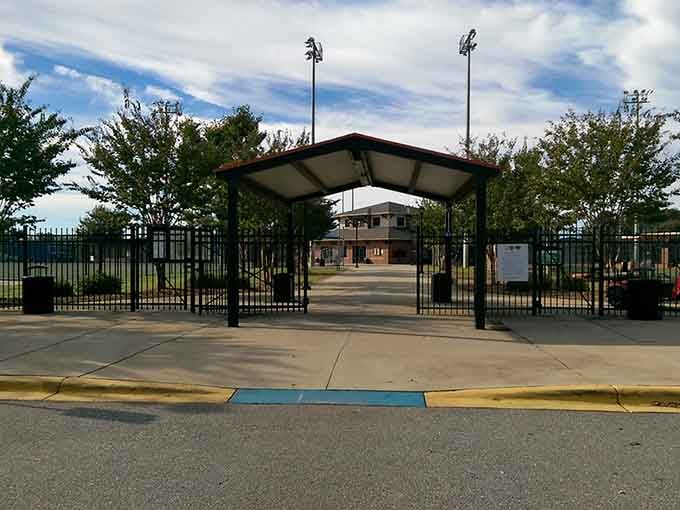 The stadium gates stand ready for Friday nights when this whole town transforms into one big, joyful family reunion.