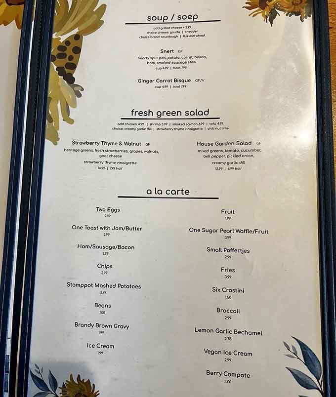 The menu reads like a love letter to Dutch cuisine, featuring everything from hearty stamppot to delicate stroopwafels.