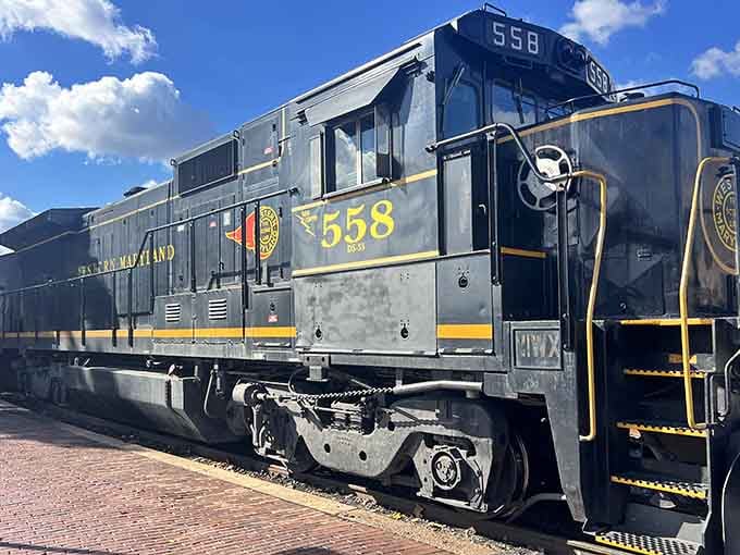 Locomotive 558 stands ready in its Western Maryland livery, basically the Clark Gable of diesel engines in vintage dress.