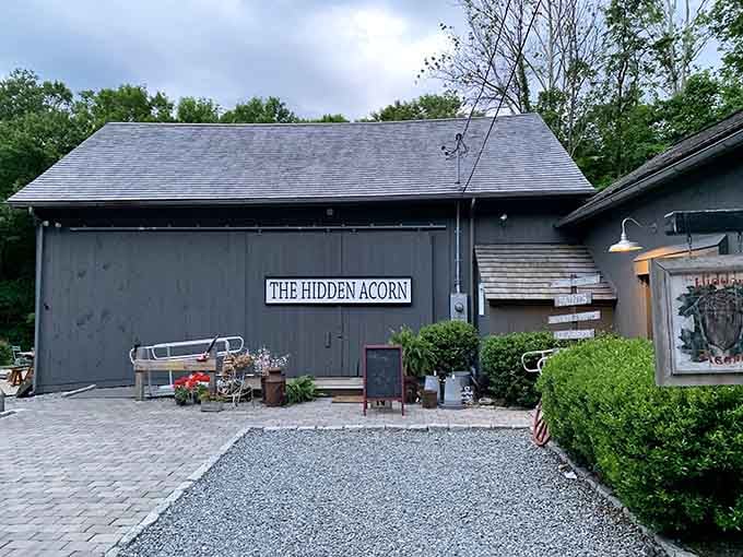 The Hidden Acorn's weathered barn exterior promises treasures inside that'll make your heart skip a beat.