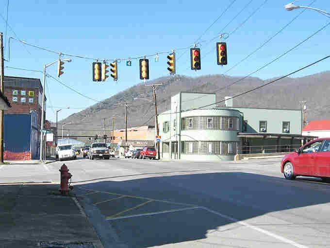 Mountains frame this main street like nature's own picture frame, with Art Deco curves adding Hollywood glamour.