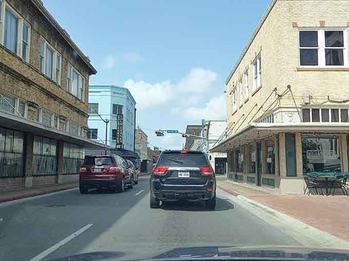 Downtown streets reveal a mix of architectural styles, from vintage storefronts to contemporary glass facades.