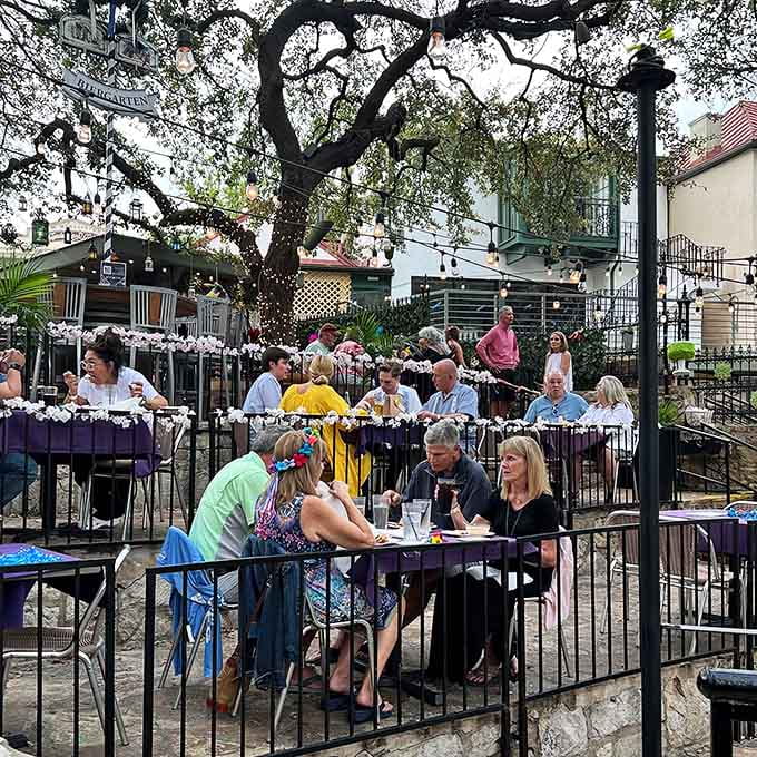 Multi-level riverside dining under twinkle lights makes every meal feel like a scene from your favorite romantic movie.