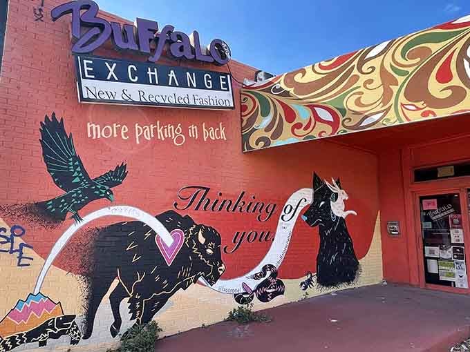 That vibrant mural practically shouts "come find your style" with more personality than a vintage Woodstock poster.