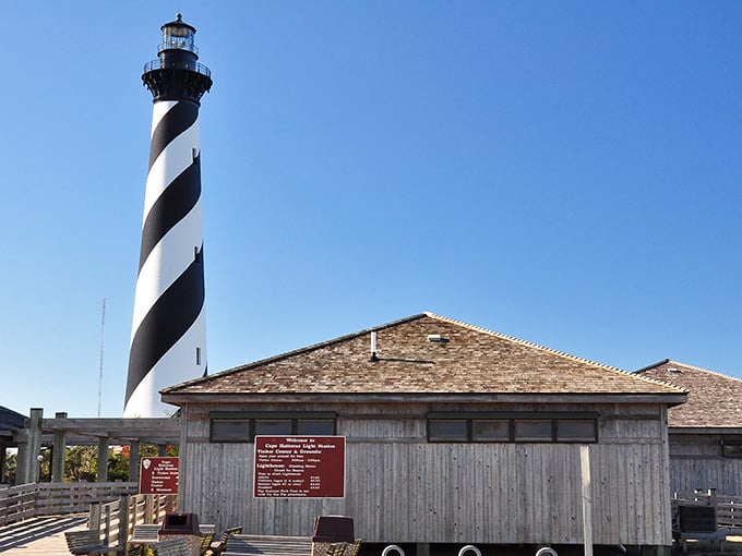 The spiral stripes create a mesmerizing barber pole effect that's been guiding ships through treacherous waters for generations.