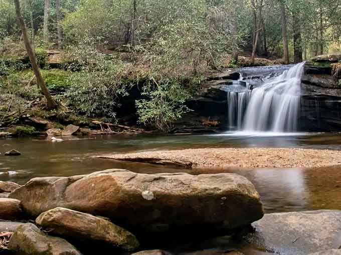 This waterfall whispers instead of roars, creating the kind of peaceful moment your soul didn't know it needed.
