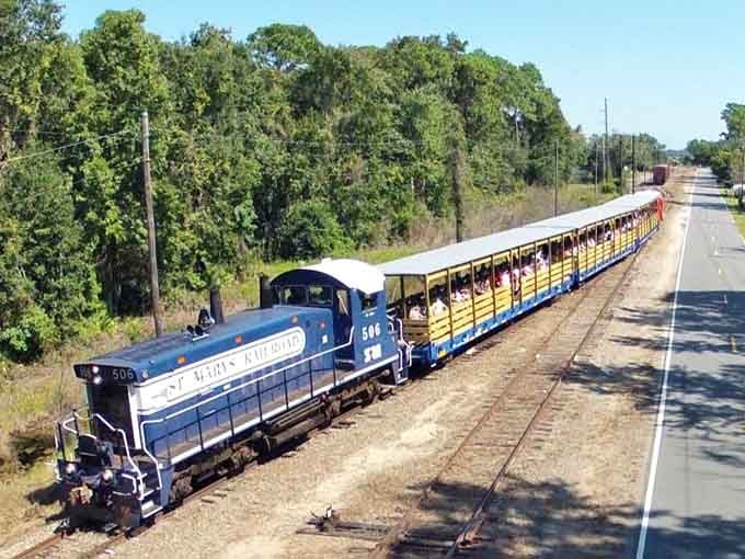 This vintage train chugging through coastal country looks like it escaped from a simpler, sweeter era.