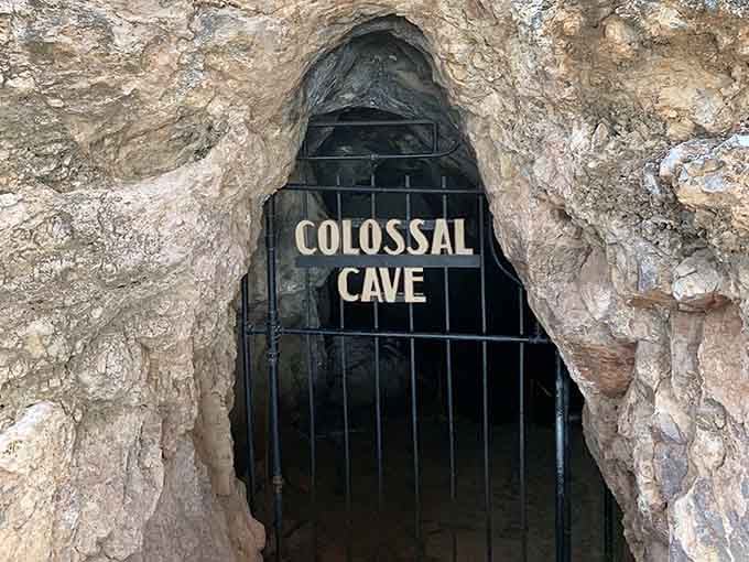 The entrance beckons like something from an Indiana Jones adventure, promising cool mysteries hidden beneath Arizona's sun-baked surface.