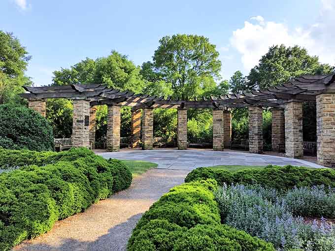 Those perfectly trimmed hedges and stone columns prove that some parks take their landscaping as seriously as Downton Abbey.
