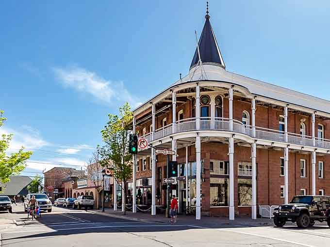 That Victorian corner building with the tower could've hosted Wyatt Earp himself for afternoon tea and gossip.