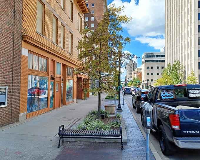 Tree-lined sidewalks invite leisurely strolls, where benches wait patiently for folks who've earned the right to sit awhile.