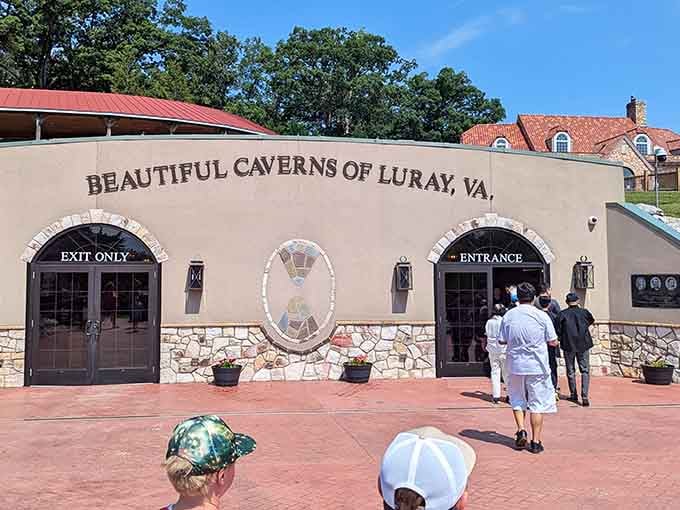The entrance promises underground wonders, and those twin archways are your gateway to nature's masterpiece below.