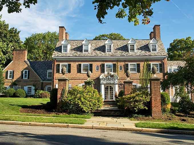 Classic brick elegance with those perfectly symmetrical windows—architecture that never goes out of style, like a good suit.