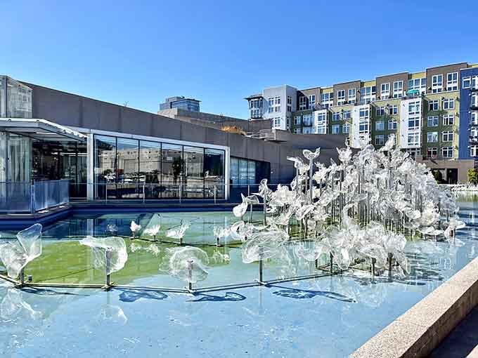 Glass sculptures floating in water like a crystalline dream—someone pinch me, this can't be real.