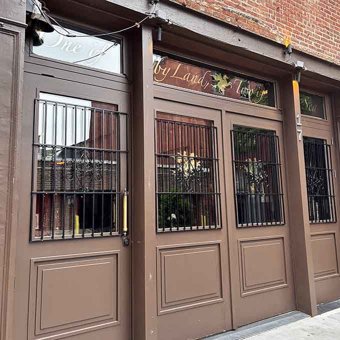 Those elegant windows and vintage signage transport you straight to colonial New York, minus the tricorn hats and wooden teeth.