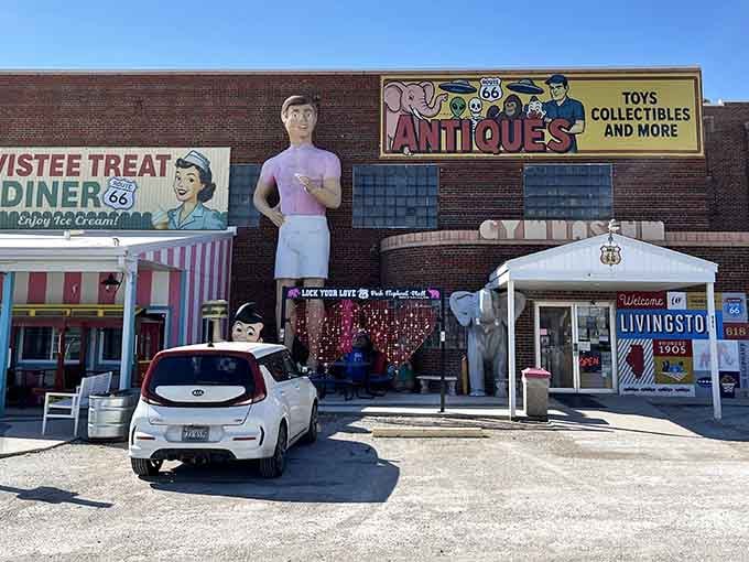 The retro diner facade and classic car complete this perfect snapshot of mid-century American roadside charm.