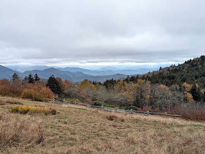 Autumn paints the mountain ridges in layers, like someone stacked different watercolor paintings against the sky.