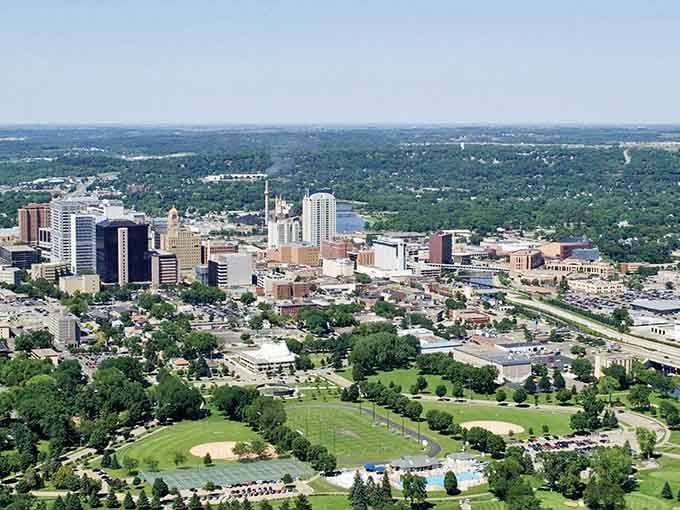 The skyline rises from lush greenery like a pop-up book, proving cities and nature can absolutely get along.