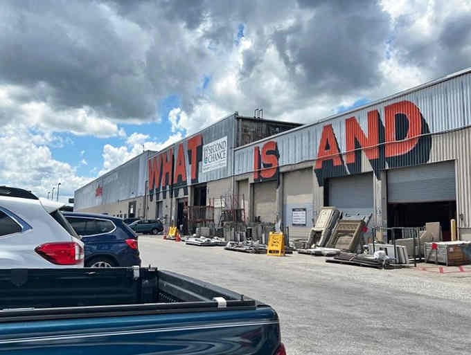 Bold red letters announce this warehouse of wonders where one person's castoff becomes your living room's conversation piece.