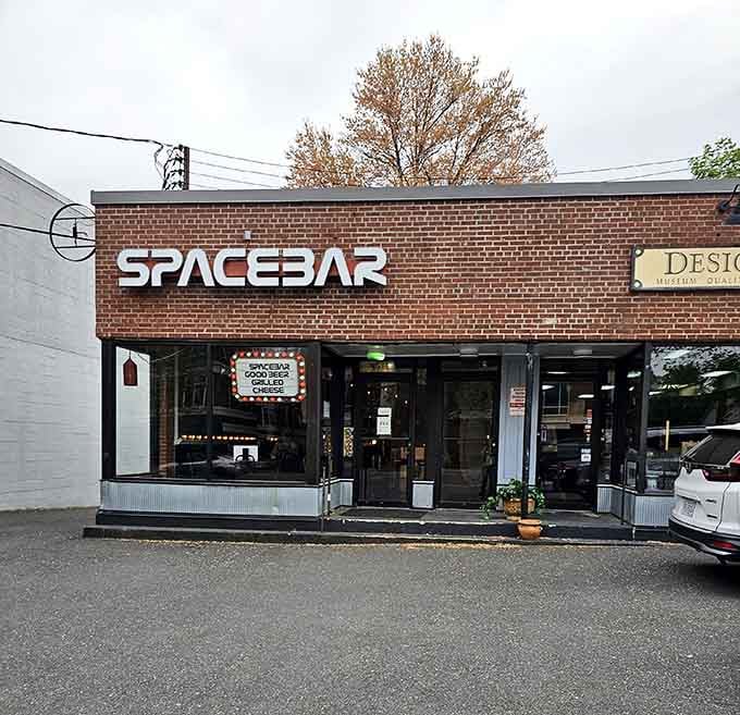 That retro-futuristic signage tells you grilled cheese is about to get seriously cosmic and seriously good.