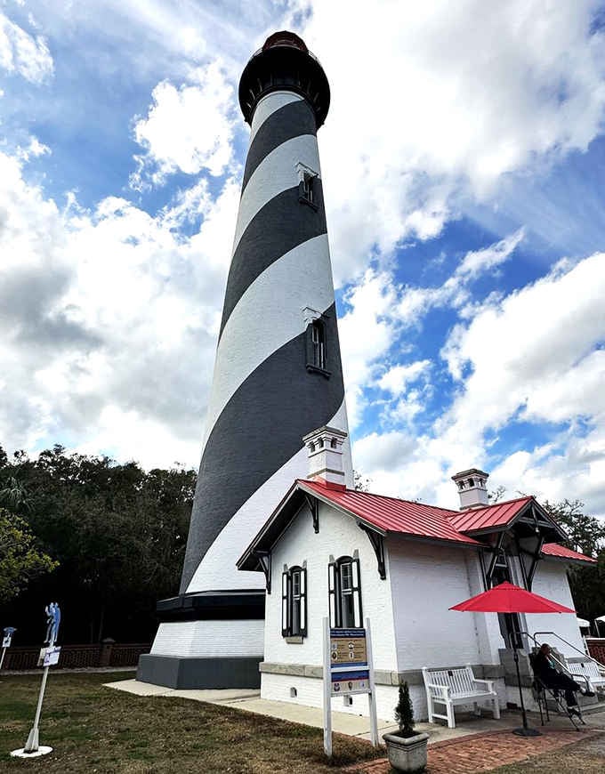 Those black and white spirals reach toward the clouds like a giant barber pole guiding ships safely home.
