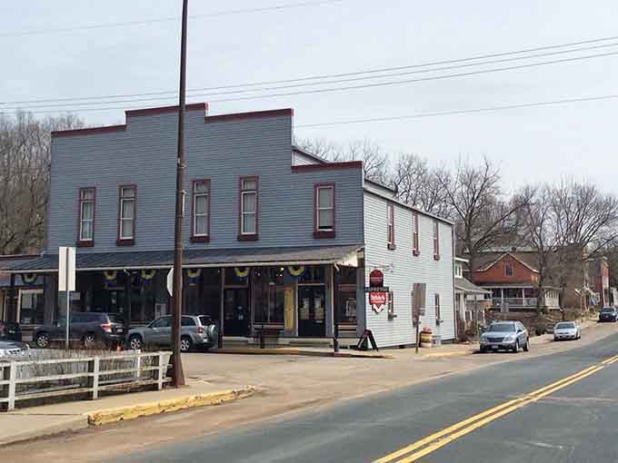 That classic false-front building stands proud on Main Street, looking ready for its close-up in any period film.