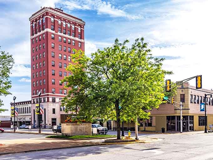 That red brick tower rises above the street like a lighthouse guiding folks to affordable small-town living.