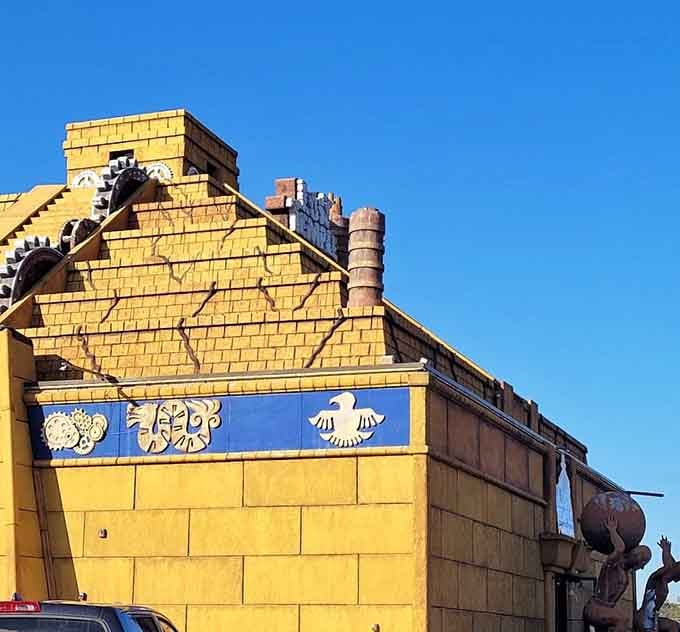Those golden pyramid walls against blue sky make you wonder if Indiana Jones might wander by any minute.