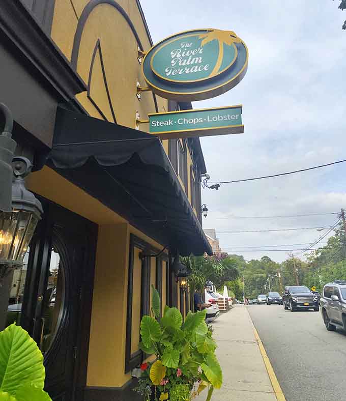 The classic hanging sign tells you everything: steak, chops, and lobster await inside this timeless establishment.