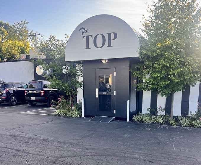 That distinctive curved entrance looks like something from a classic movie set&mdash;timeless style never goes out of fashion.