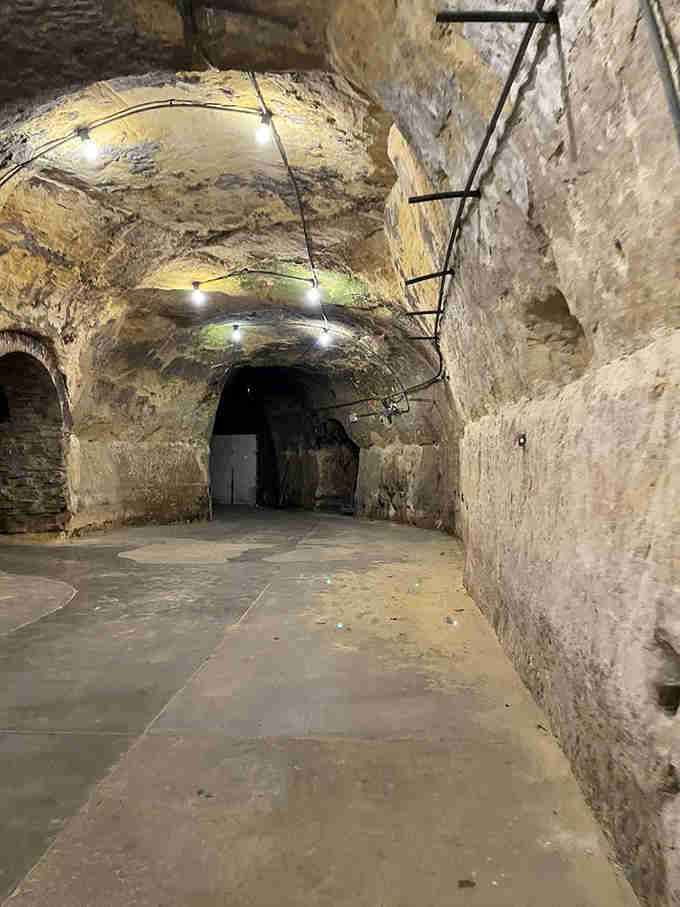 Step into these arched sandstone tunnels where gangsters once danced and secrets still echo through the walls.