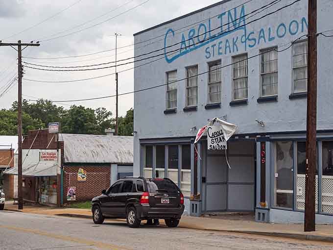 That vintage steak and saloon sign has been welcoming hungry travelers since your parents were probably dating.