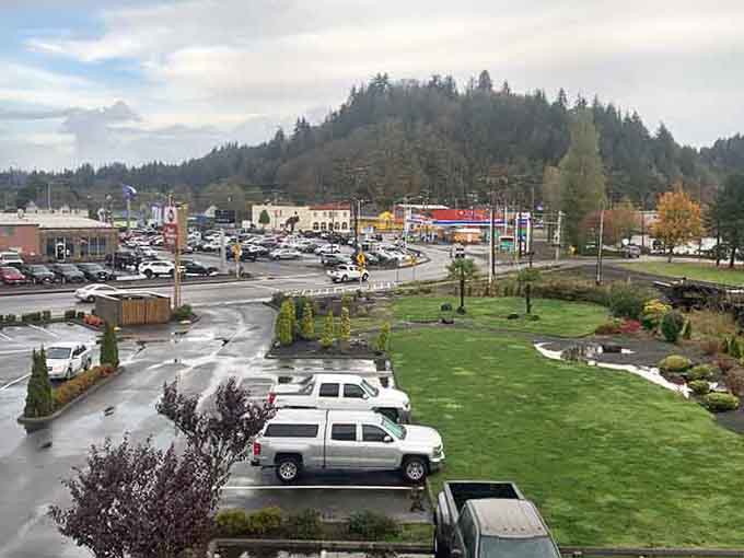 Forested hills embrace this valley town where your view comes free with every glance out the window.