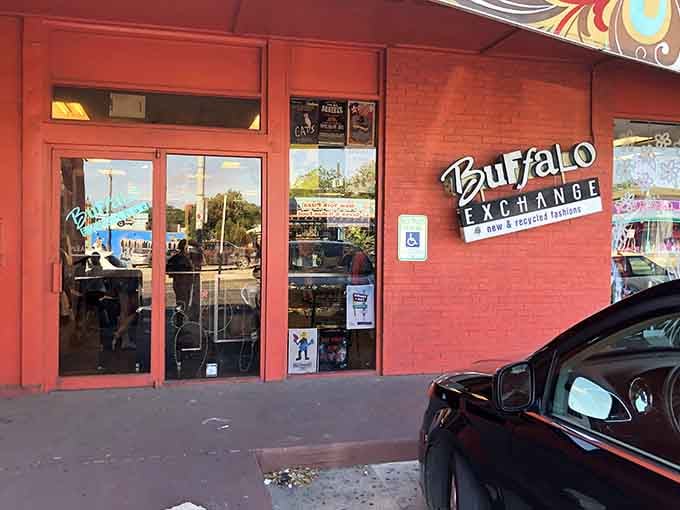 The bright coral entrance invites you into a world where recycled fashion meets Austin's legendary creative spirit.