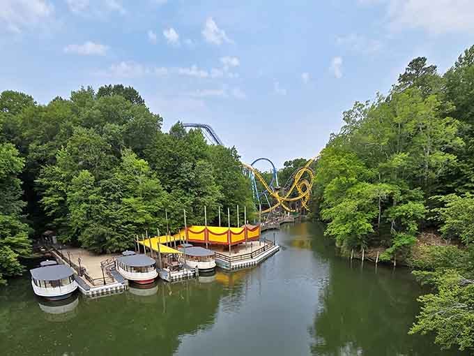 Those riverside boats waiting below the coasters add a touch of old-world charm to modern thrills.