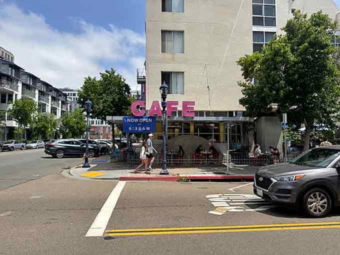 Bright and inviting, this café’s vibrant exterior and lively signage welcome guests for a perfect breakfast outing.