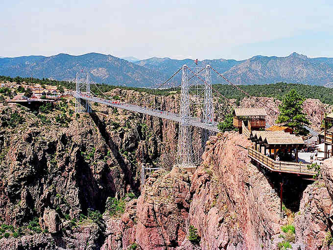 The Royal Gorge Bridge stretches across the canyon like nature's own thrill ride, proving retirement can still be exciting.