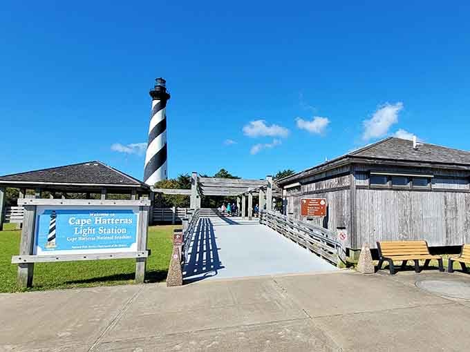 Those weathered wooden buildings tell stories of lighthouse keepers who called this remote outpost home for decades.