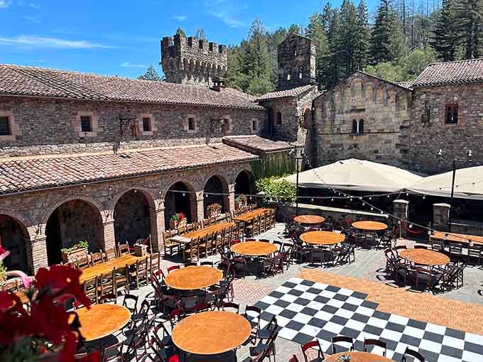 The courtyard's checkered floor and stone arches transport you straight to Tuscany, wine glass firmly in hand.