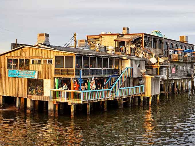 Golden hour transforms these waterfront structures into something straight out of a nostalgic coastal postcard.