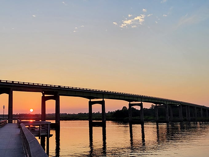 Sunset paints the bridge and water in shades that no camera can quite capture accurately.