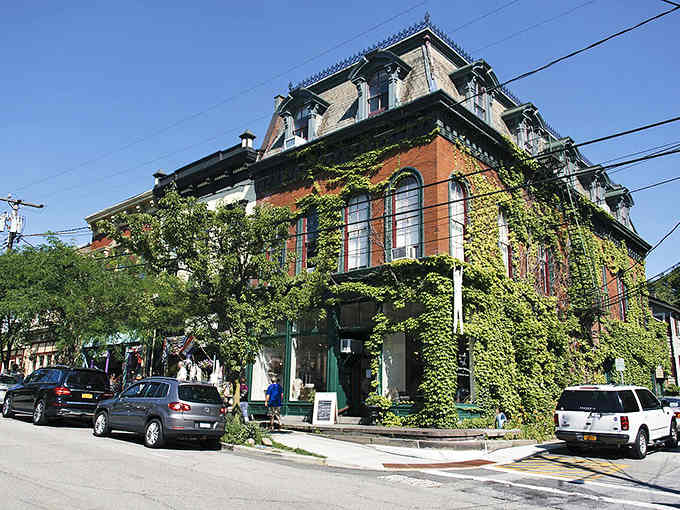 Ivy climbs this elegant building like nature's decorating the town for a party that's been going on for centuries.