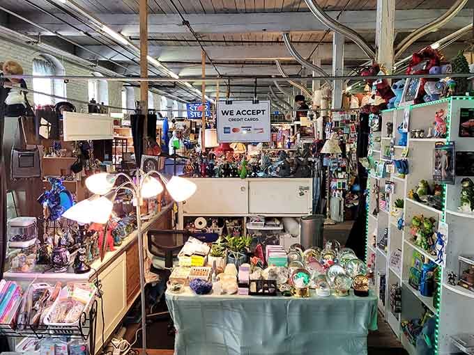 Shelves packed with vintage treasures and quirky finds make this booth feel like a delightful little world of its own.